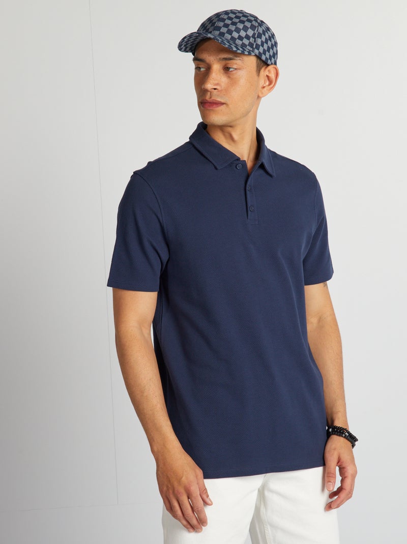 Polo liso con textura - NEGRO - Kiabi - 12.00€